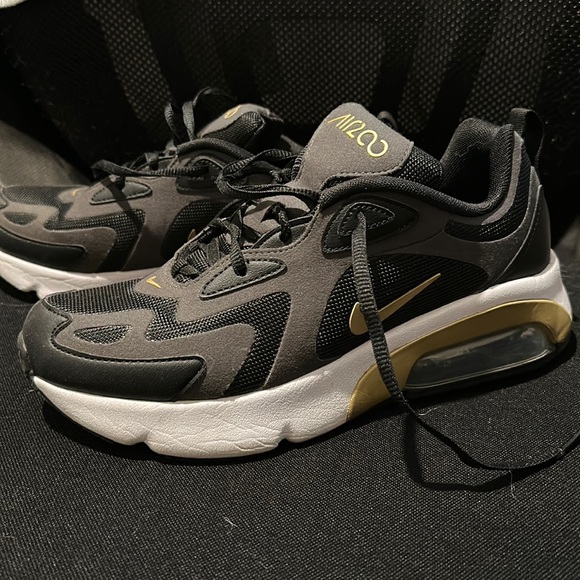 Nike | Shoes | Primary Color Is Black Gold Nike Check White Sole Owned ...